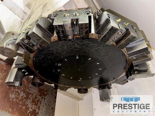 OKUMA V100R Tours CNC 668717 - MachineTools.com